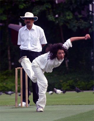 Natasha Miles bowling for HKCC against KCC | ESPNcricinfo.com