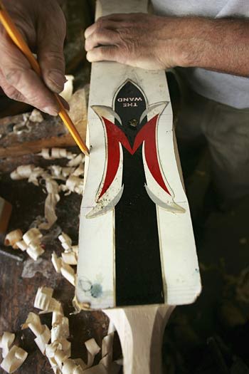 A template is used to mark the distinctive scoops on the Andrew ...