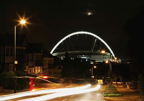 Wembley's new arch lights up in celebration of England's win ...