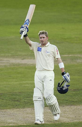 Michael Clarke acknowledges the crowd following his century ...