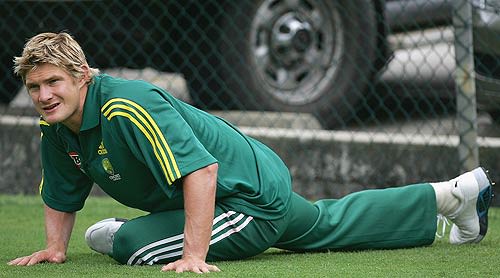 Shane Watson performs his stretching exercises | ESPNcricinfo.com