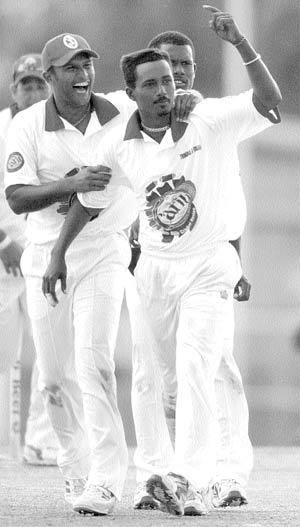 Dave Mohammed celebrates on his way to 5 for 41 | ESPNcricinfo.com