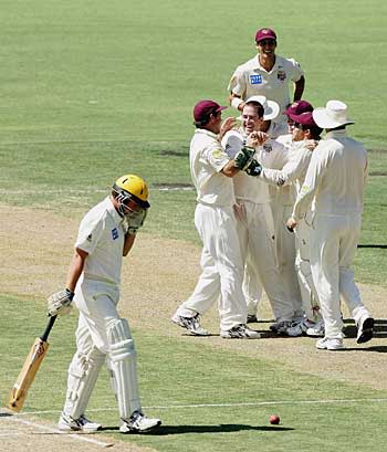 Daniel Doran is mobbed by his team-mates | ESPNcricinfo.com