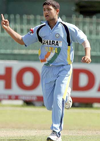 Piyush Chawla celebrates one of his four wickets | ESPNcricinfo.com