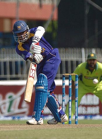 Chamara Kapugedera plays on the on side during his half-century ...