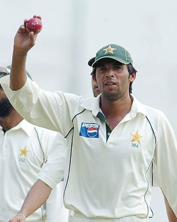 Mohammad Asif shows the ball that got him his first five-wicket haul ...