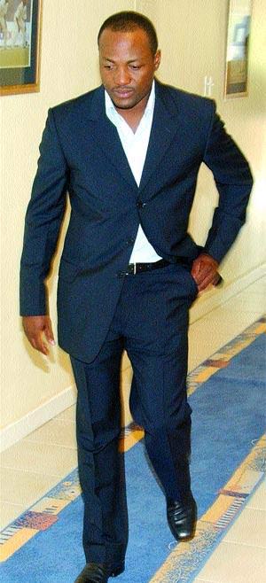 Brian Lara arrives for the meeting to announce his re-appointment as ...