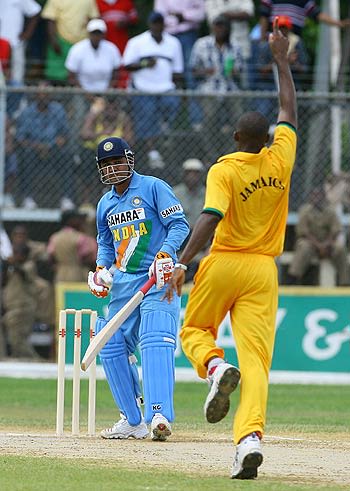 Daren Powell celebrates the fall of Virender Sehwag | ESPNcricinfo.com