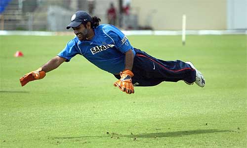 Mahendra Singh Dhoni leaps as he practises ahead of the third Test ...