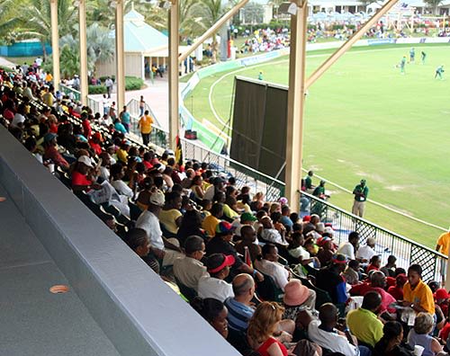 Crowds on the main stand watch the teams warm up | ESPNcricinfo.com