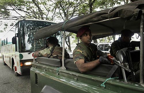 An armed pilot vehicle leads the Indian bus to practice | ESPNcricinfo.com