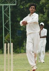 Mohammad Ayazuddin, son of Mohammad Azharuddin, skips in to bowl ...