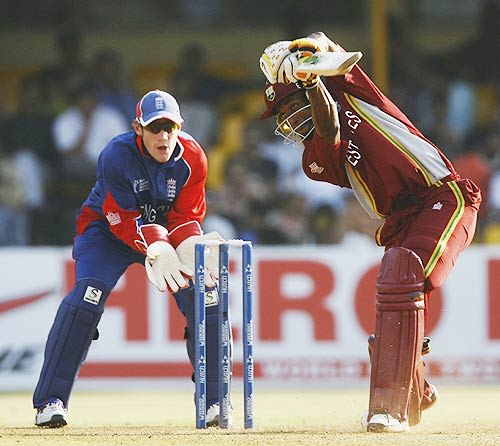 Chris Read can only watch as Dwayne Bravo drives through the off side | ESPNcricinfo.com