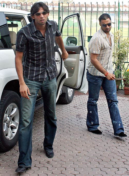 Mohammad Asif and Shoaib Akhtar arrive at the Gaddafi Stadium for a ... Mohammad Asif and Shoaib Akhtar arrive at the Gaddafi Stadium for a ...