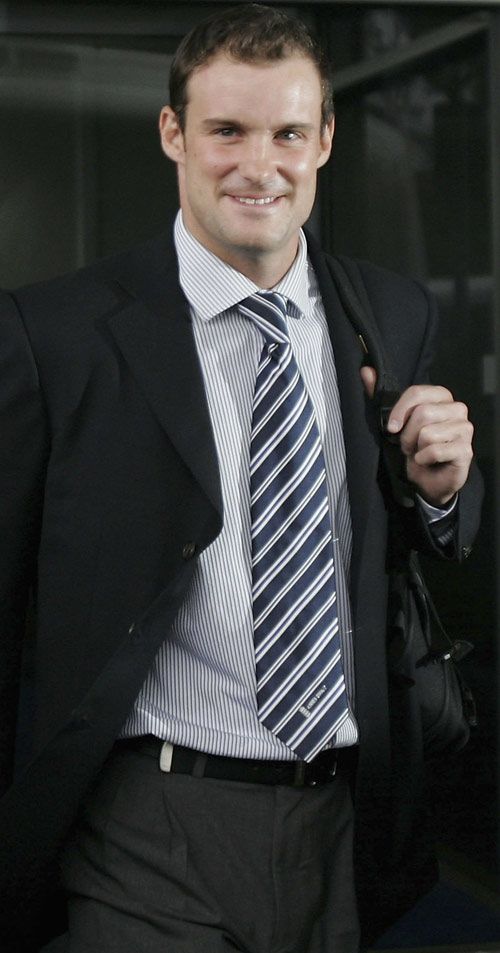 Andrew Strauss smiles to the cameras after arriving in Sydney for ...