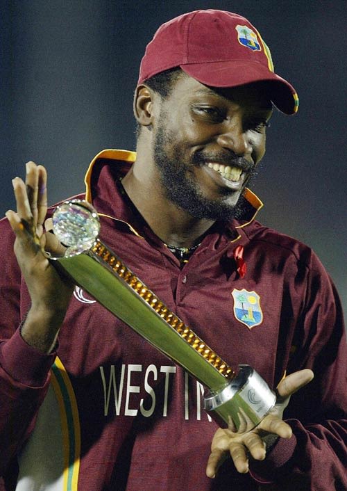 Chris Gayle poses with a 'Man of the Series' Trophy | ESPNcricinfo.com