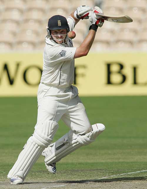 Textbook: Ian Bell forces through the off side during his century ...
