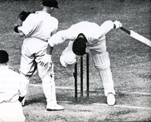 Stan Worthington topples onto his stumps after pulling Chuck Fleetwood ...