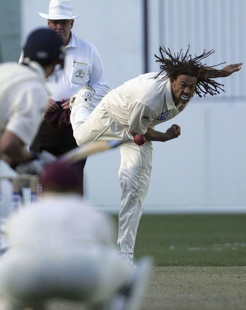 Andrew Symonds turns his arm over towards the end of the day | ESPNcricinfo.com