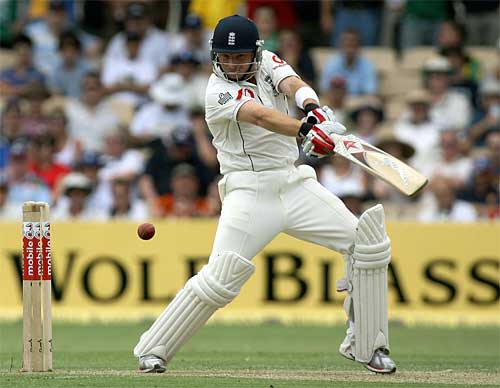 Ian Bell cuts as he brings up his half-century just before tea ...