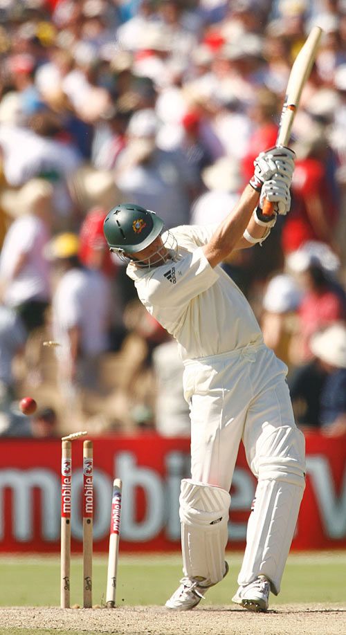 Stuart Clark swings, misses and is bowled by Matthew Hoggard ...