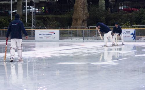 A solid forward defence during a charity match played on an ice rink in ...