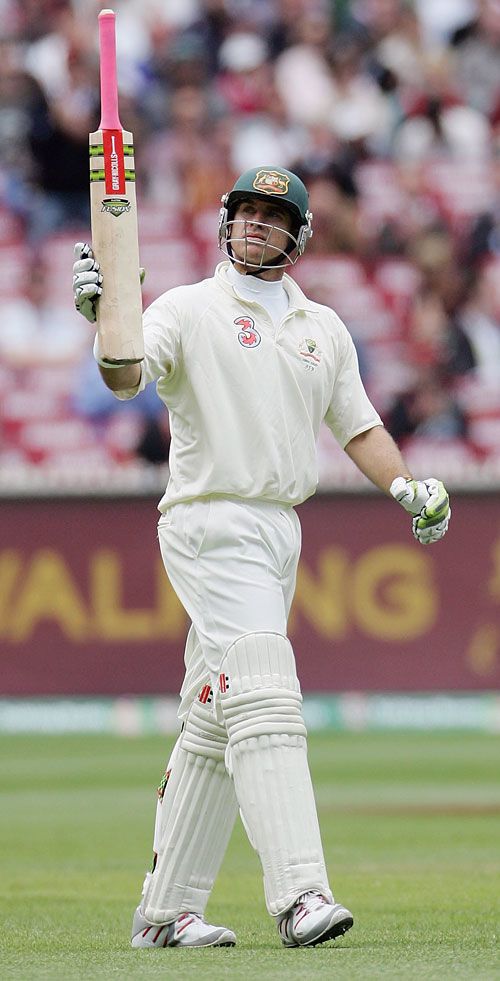 Matthew Hayden raises his bat on reaching fifty | ESPNcricinfo.com
