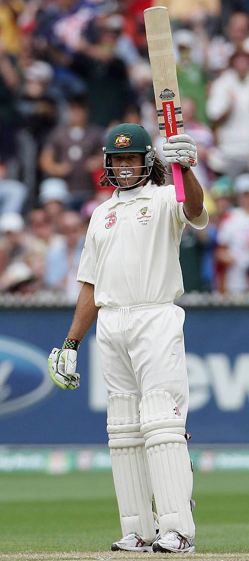 Andrew Symonds raises his bat after scoring his third Test half-century ...