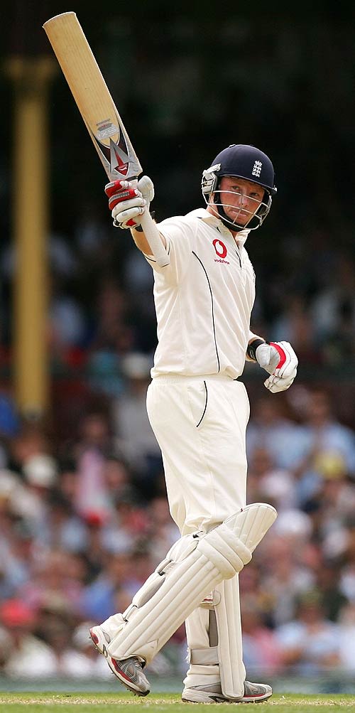 Ian Bell raises his bat after reaching his half-century | ESPNcricinfo.com