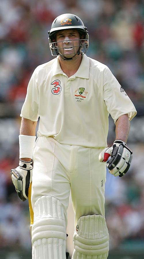 Michael Hussey walks off after being caught behind for 37 early on the ...