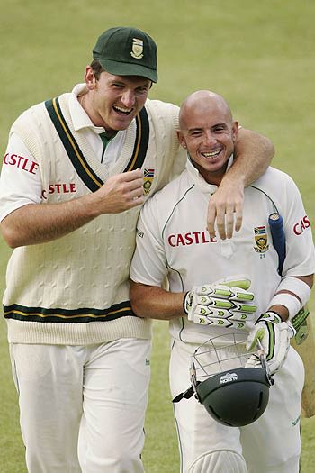 Graeme Smith and Herschelle Gibbs share a light moment after the win ...