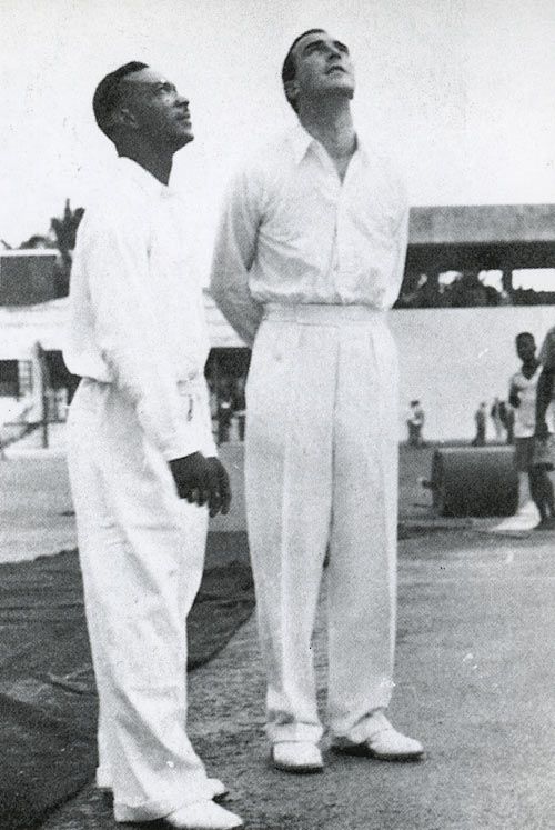 Ken Cranston, England's stand-in captain, and George Headley toss ...