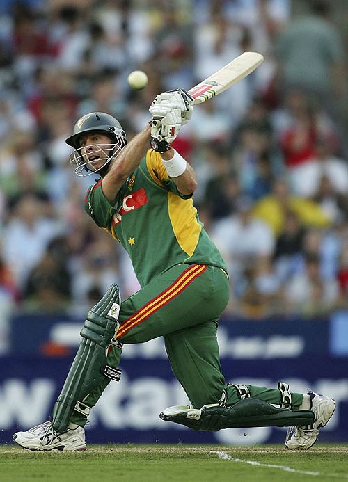 Michael Dighton smashes another boundary during his 111 | ESPNcricinfo.com