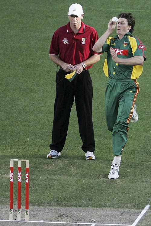 Brendan Drew bowls during his spell of 2 for 32 from four overs ...