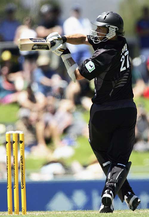 Shane Bond swings hard during his unbeaten 22 | ESPNcricinfo.com