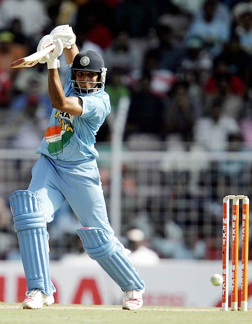 Suresh Raina picks up a boundary in his 23 | ESPNcricinfo.com