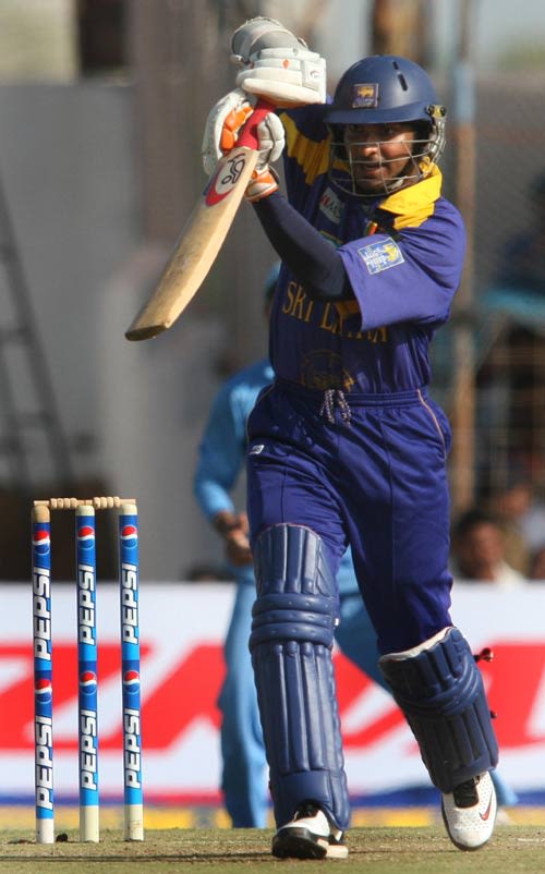 Kumar Sangakkara demonstrates how to play the straight-drive ...