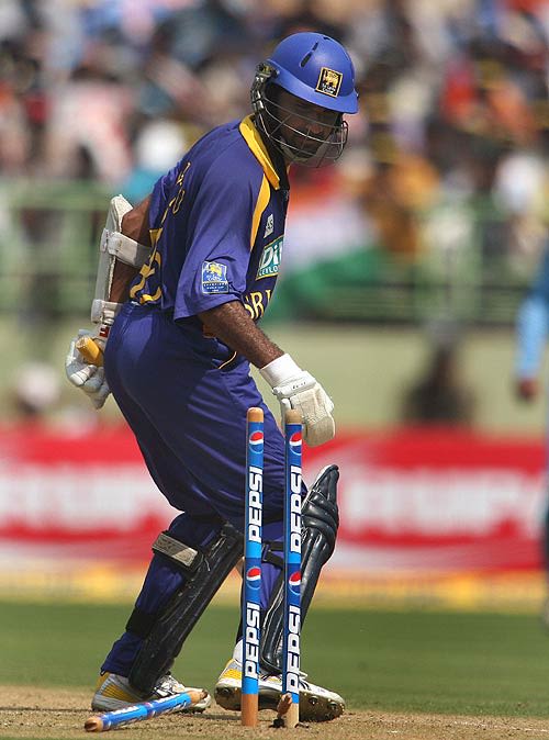 Marvan Atapattu got an inside edge that uprooted his off stump ...