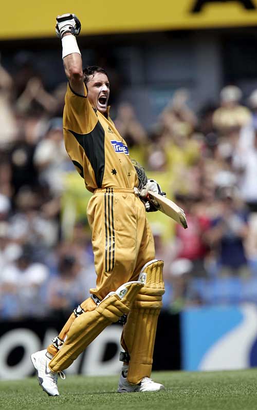 Mike Hussey celebrates reaching his century | ESPNcricinfo.com