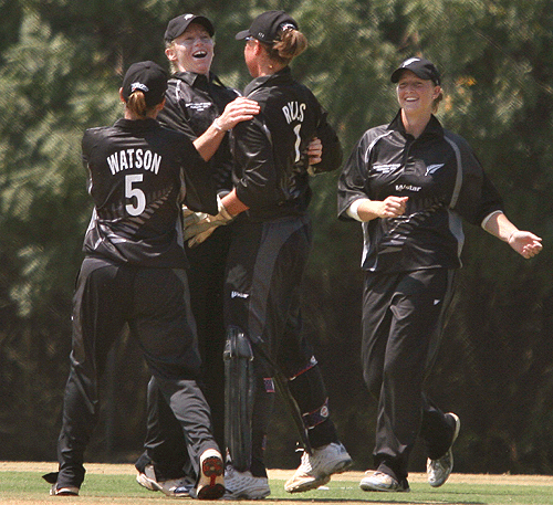 New Zealand players celebrate the wicket of Lisa Sthalekar ...