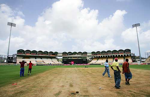 Groundstaff apply finishing touches at the Beausejour Stadium in St ...