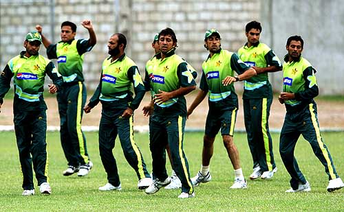 Pakistani cricketers stretches during a practice session in Kingston ...