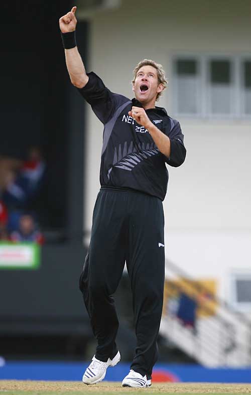 Jacob Oram celebrates removing Ian Bell in his first over ...