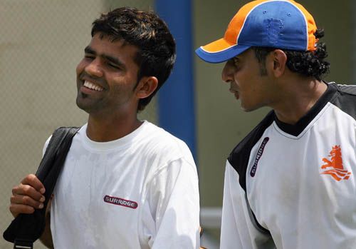 Mohammad Kashif and Adeel Raja walk in to practice at Warner Park ...