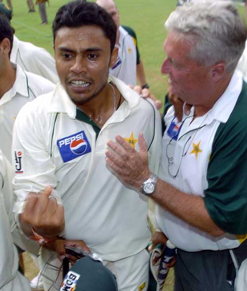 Danish Kaneria and Bob Woolmer celebrate a famous victory ...