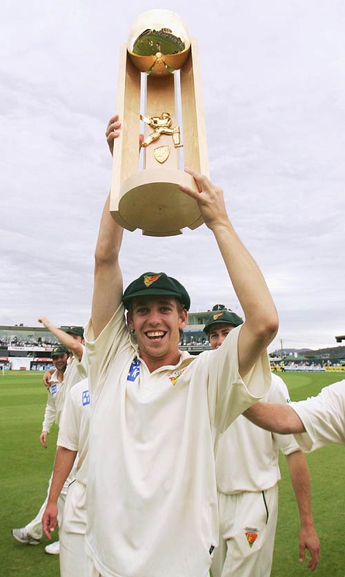 Man of the Match Luke Butterworth lifts the Pura Cup | ESPNcricinfo.com