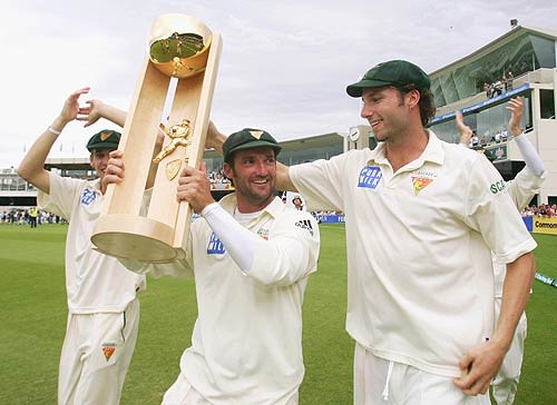 Michael Di Venuto and Adam Griffith celebrate the Tigers' win ...