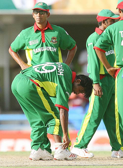 Tapash Baisya injured his foot while bowling and had to go off the ...