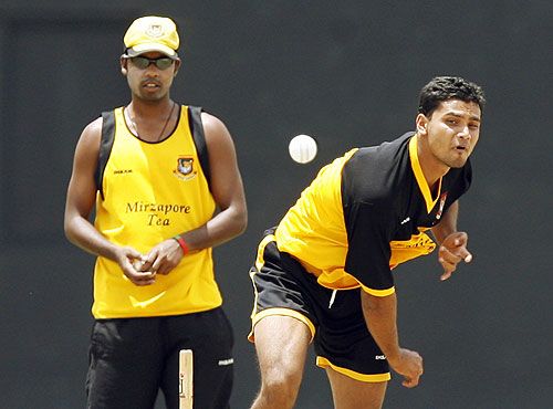 Syed Rasel looks on as Mashrafe Mortaza bowls | ESPNcricinfo.com