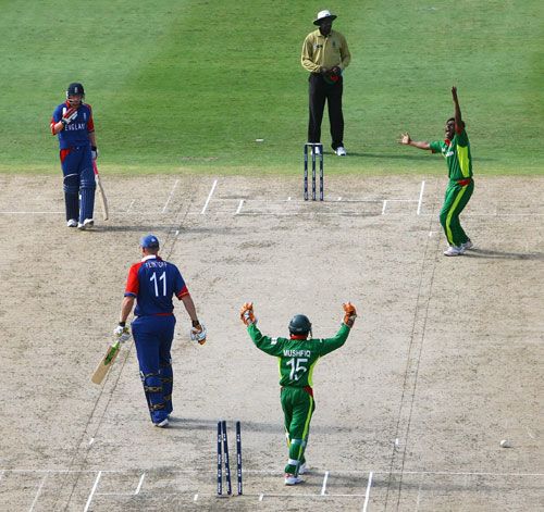 Mohammad Rafique roars his delight after bowling Andrew Flintoff ...